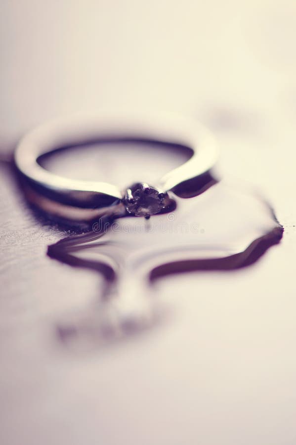 Ring in a drop of water stock image. Image of couple - 57607689