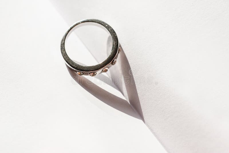 Ring Falling Shadow in the Shape of Heart Stock Image - Image of love ...