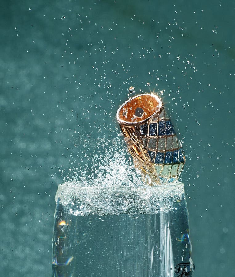 The Ring Falls into a Glass of Water Stock Image - Image of edeg ...