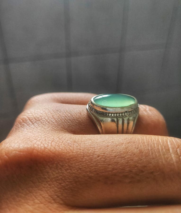 Ring Finger with Green Stone Ring Stock Image - Image of silver, batu ...
