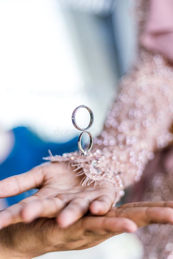 Ring Flying Over Hands. Coupled Hands, Groom and Bride and Wedding ...