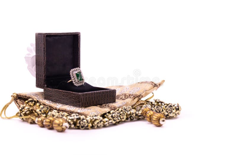 Ring Gift Concept. Emerald Ring in a Lather Gift Box with Decorative ...