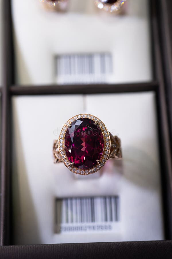 Ring with Huge Ruby and Diamonds. Close Up. Beauty and Fashion Concept ...