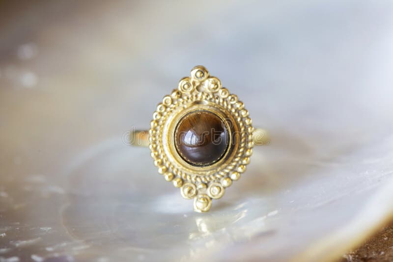 Ring in Indian Oriental Style on Natural Neutral Shell Background Stock ...