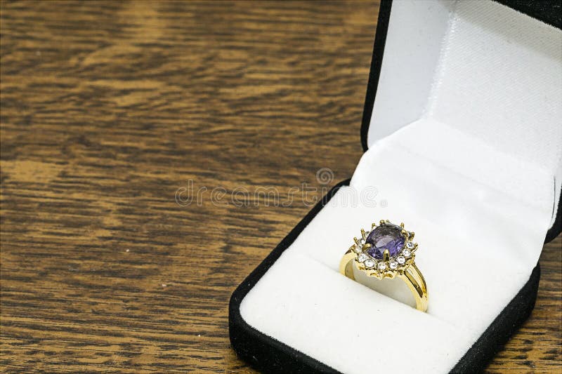 Ring in a Jewelry Box on Wooden Background with Its Screen Stock Image ...