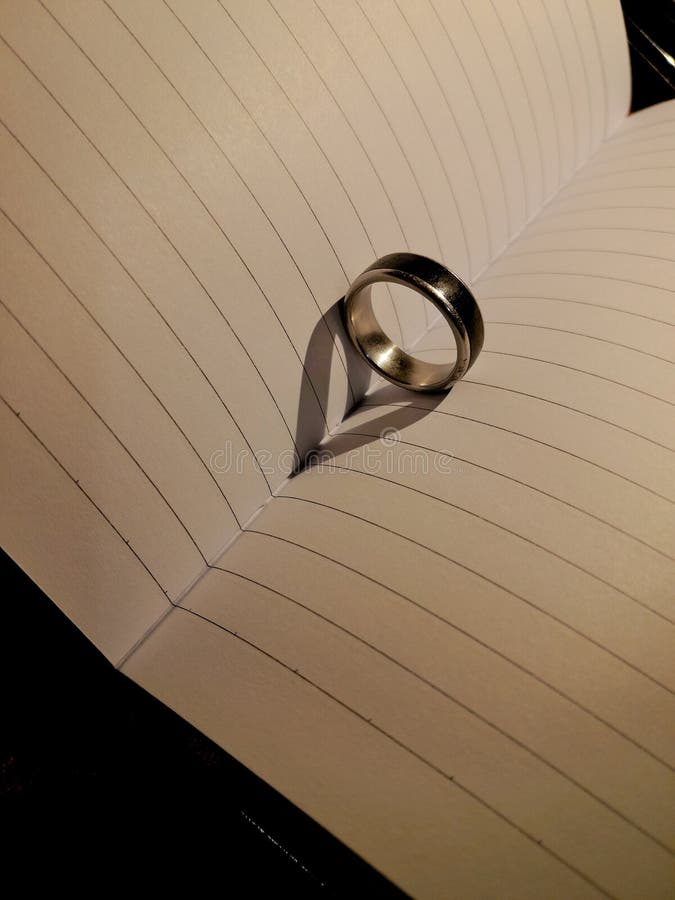 The Ring on the Paper Where the Light Refracts Forms the Shadow of a ...