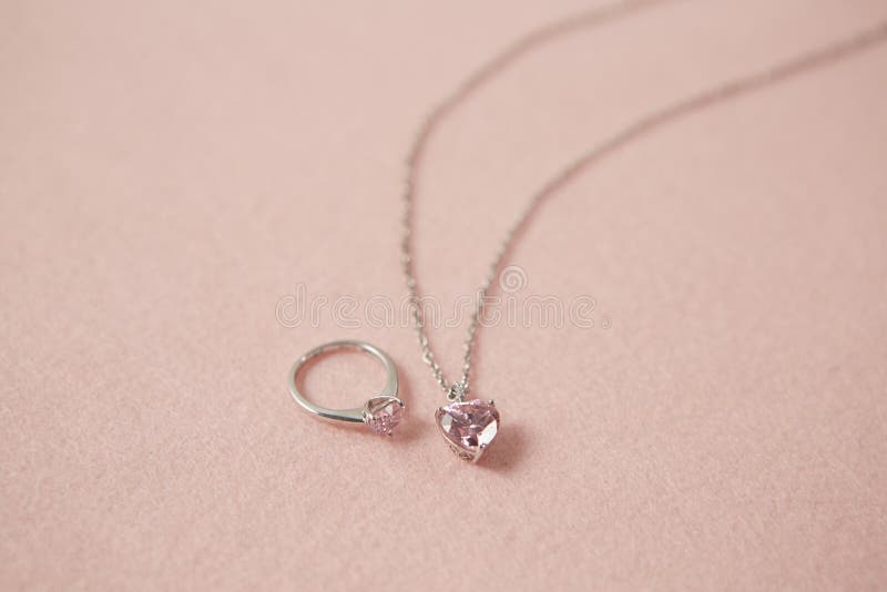 Pink Background with Necklace Stock Photo - Image of fine, design: 460280