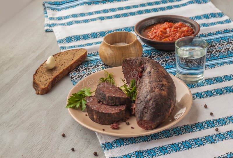 Ring Pudding Sausages on a Plate with Glass of Vodka Stock Image ...