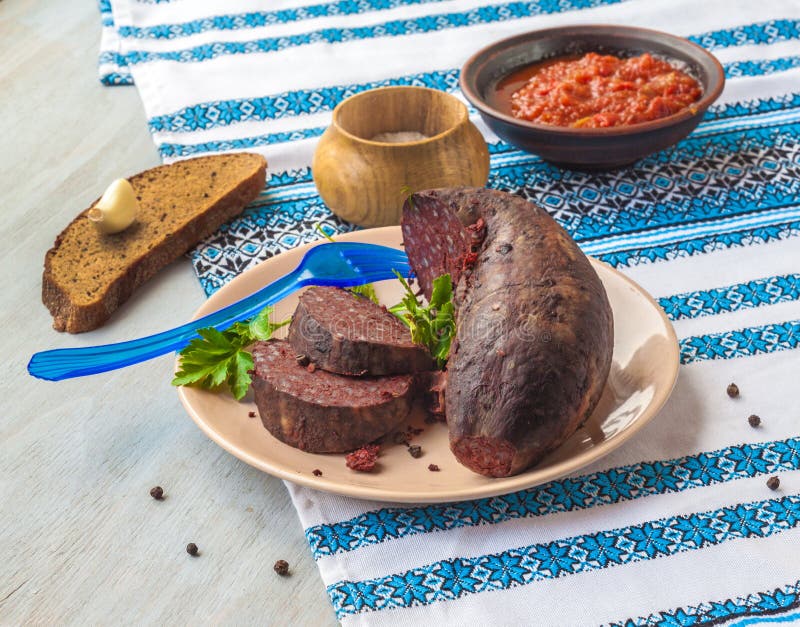 Ring Pudding Sausages on a Plate with Stock Photo - Image of blutwurst ...