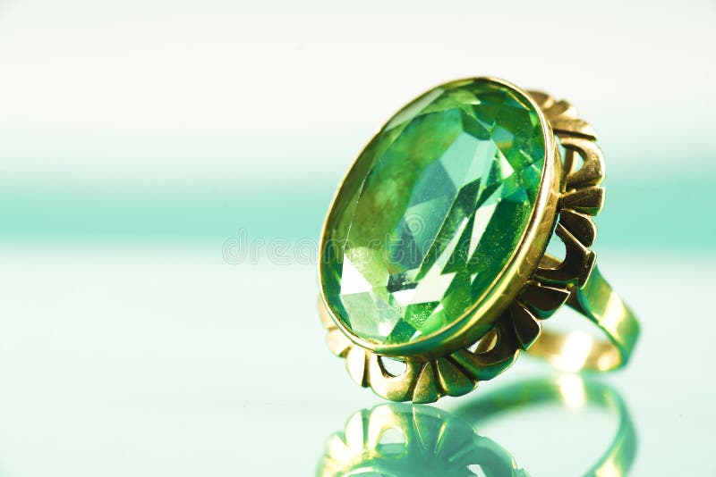 A Ring with a Sapphire on a Light Sapphire Background Stock Photo ...