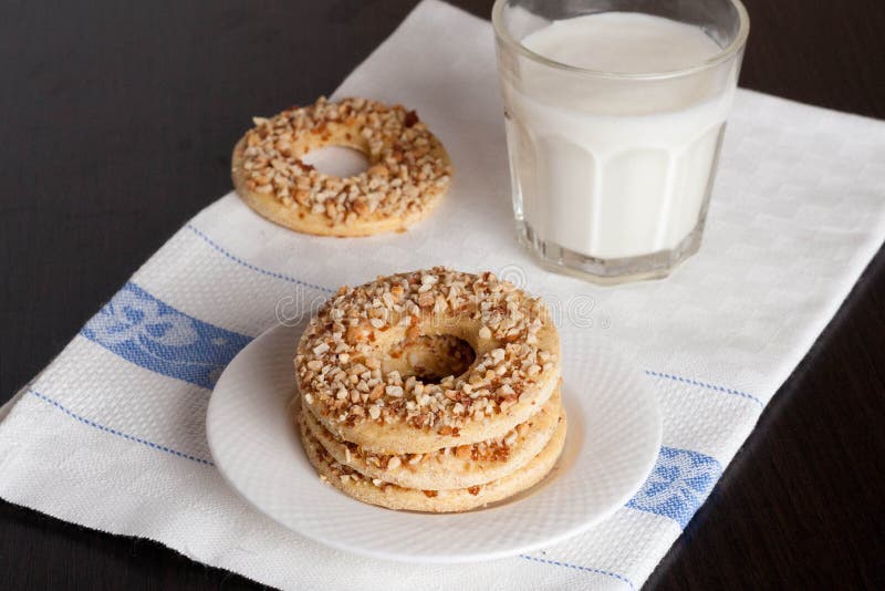 Ring Shortbread Cookies with Nuts and Glass of Milk or Yogurt Stock ...