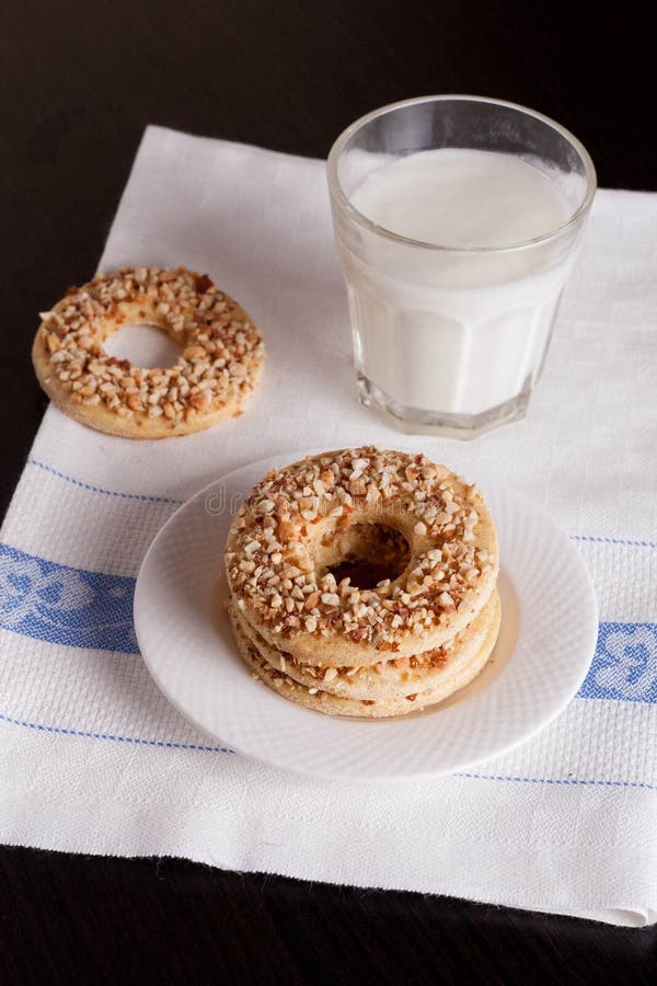 Ring Shortbread Cookies with Nuts and Glass of Milk or Yogurt Stock ...