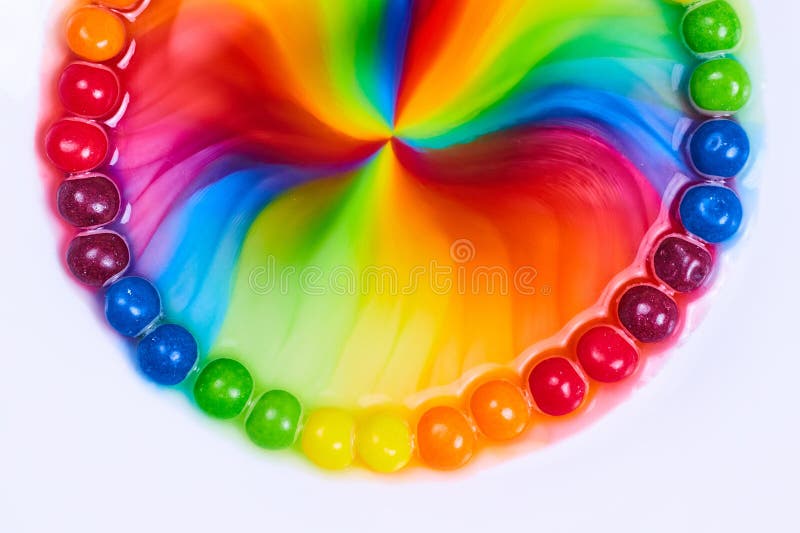 Ring of Skittles Candy with Rainbow Tie Die Background Stock Image ...
