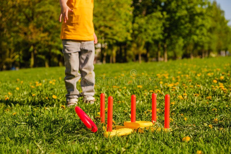 Ring Throw Summer Game on a Green Lawn in the Sun Stock Photo - Image ...