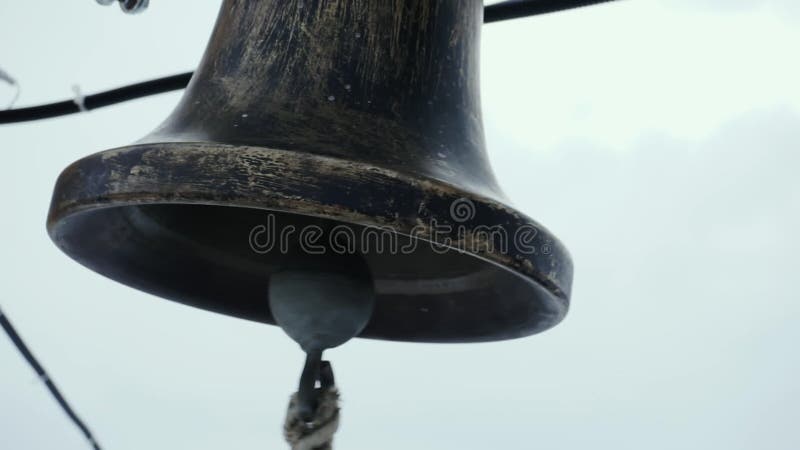 The Ringer Pulls the Rope of a Bronze Bell. Stock Video - Video of holy ...