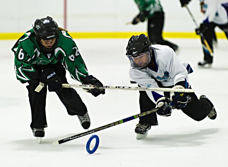 Ringette Players in Action at Hockey Rink Stock Image - Image of ...