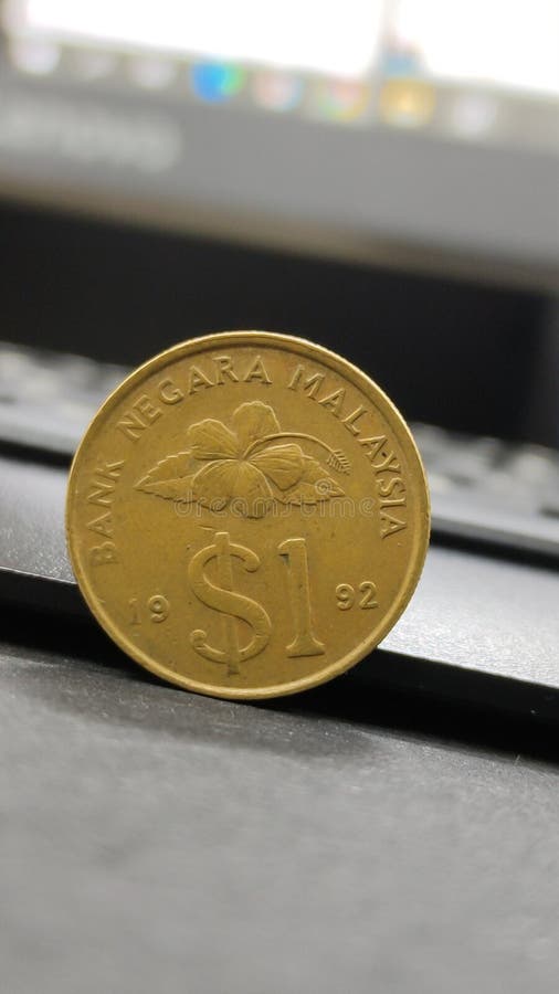 Ringgit Malaysia $1 stock image. Image of brass, label - 276096743