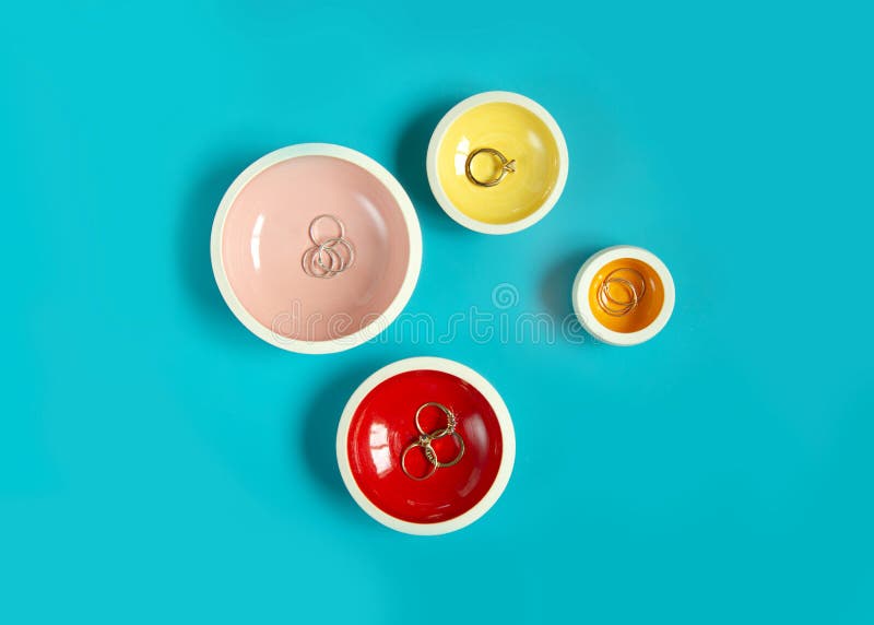 Rings in bowls stock photo. Image of bowls, small, teal - 139847604