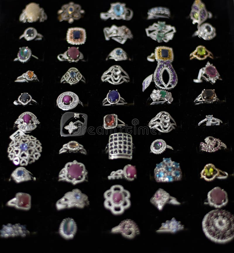 Rings with Different Precious Stones, Materials, Sizes and Shapes in ...