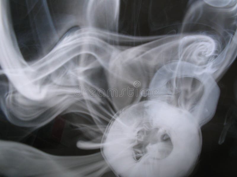 Rings of smoke stock photo. Image of cigar, fire, cigarette - 1233746