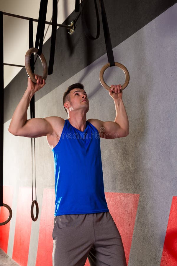 Rings Workout Man at Gym Hanging Stock Photo - Image of male, athletic ...