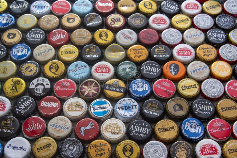 Stack of beer bottle caps editorial photography. Image of hoegarden ...