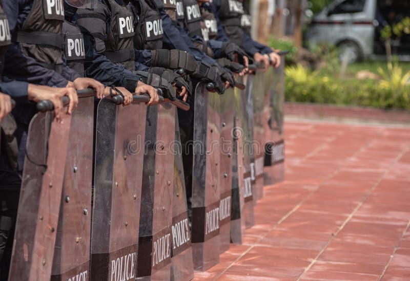 Riot Police Control the Crowd. Stock Photo - Image of rally, block ...