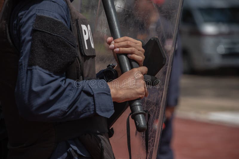 Riot Police Control the Crowd. Stock Photo - Image of batons, authority ...