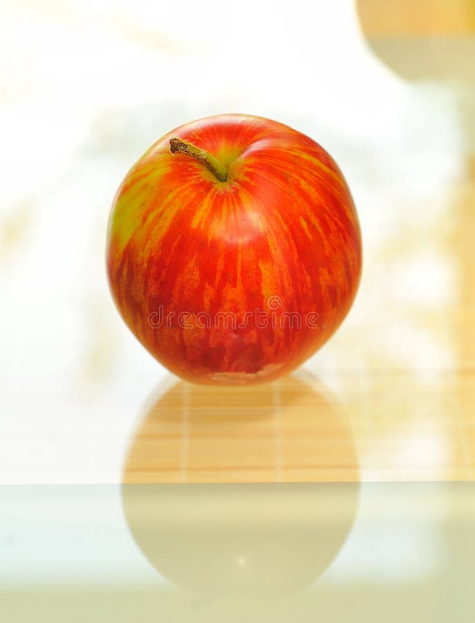 Ripe Apple on Glass Table . Stock Image - Image of detail, shot: 32456531