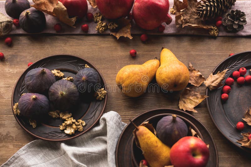 Ripe Autumn Fruits on Table Stock Image - Image of wood, season: 106205987