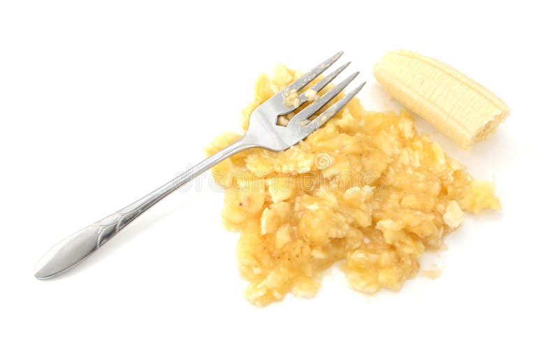 Mashed Banana With Fork And An Unpeeled Fruit Stock Photo - Image of ...