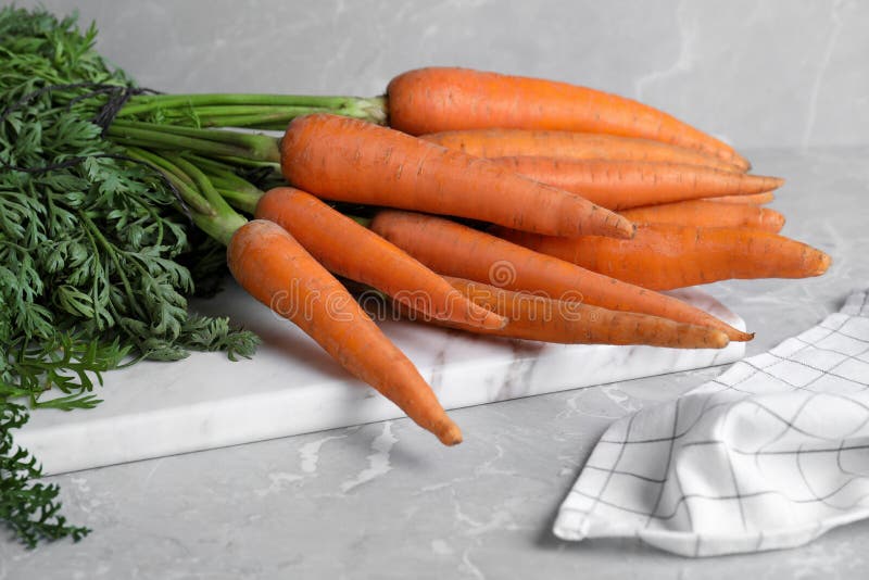 Ripe Carrots on Light Grey Marble Table Stock Image - Image of diet ...
