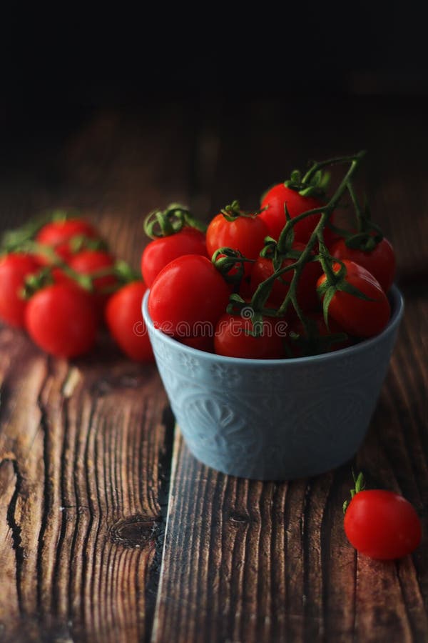 Cherry Tomatoes on the Table in Low Key Stock Photo - Image of plant ...