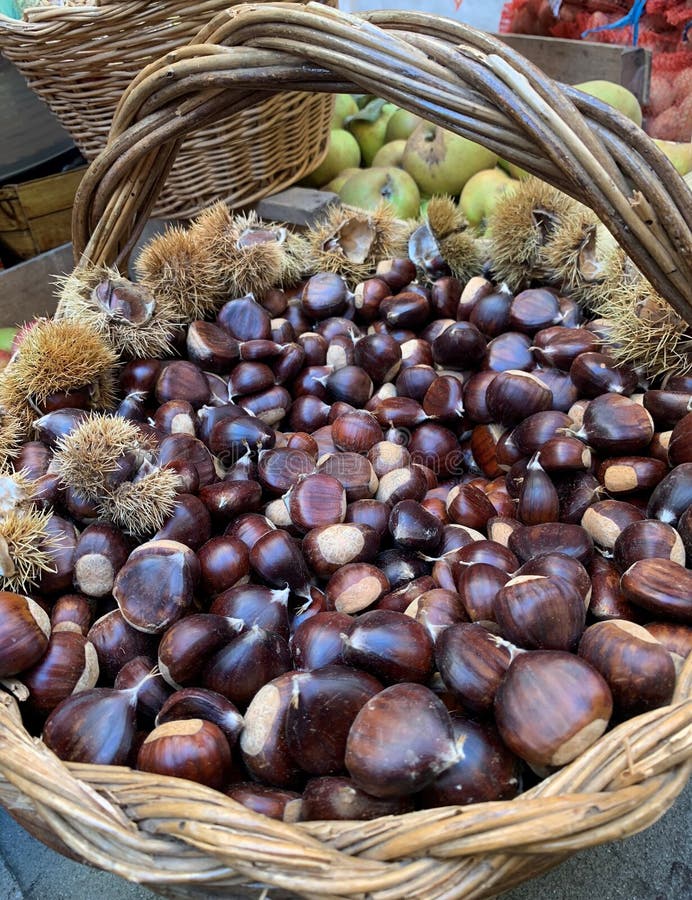 Ripe Chestnuts in a Wicker Basket on a Fruit Market. Stock Photo ...