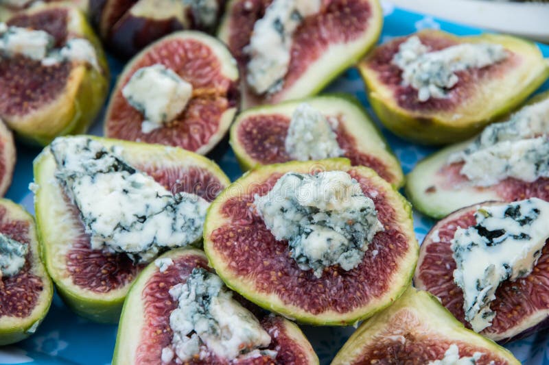 Ripe figs with blue cheese stock photo. Image of fruit - 335276194