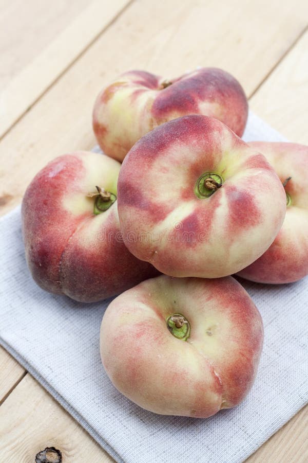 Ripe flat Chinese peaches stock photo. Image of summer - 57772822