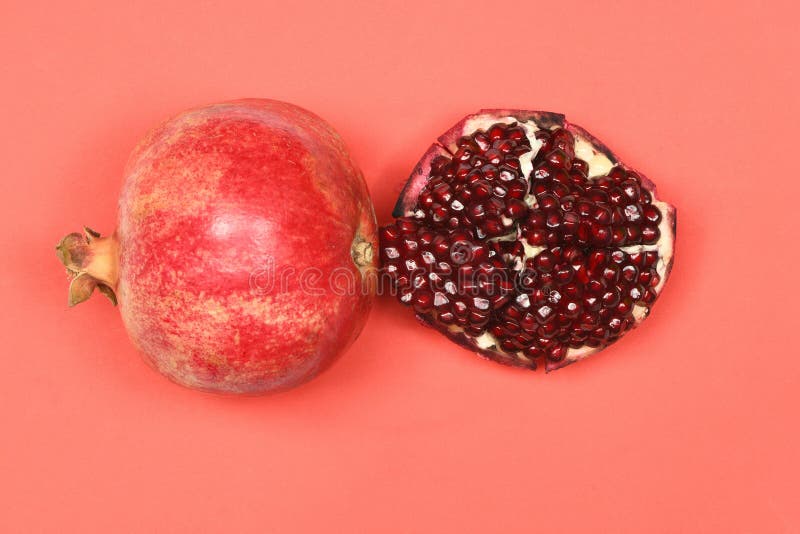 Ripe Fresh Garnet Fruit Isolated on Red Background Stock Photo - Image ...