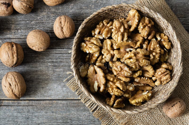 Walnut Kernels in a Bowl on a Rustic Table Stock Image - Image of ...