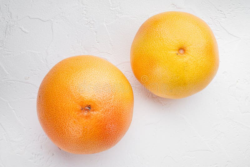 Ripe Grapefruit, on White Stone Table Background, Top View Flat Lay ...