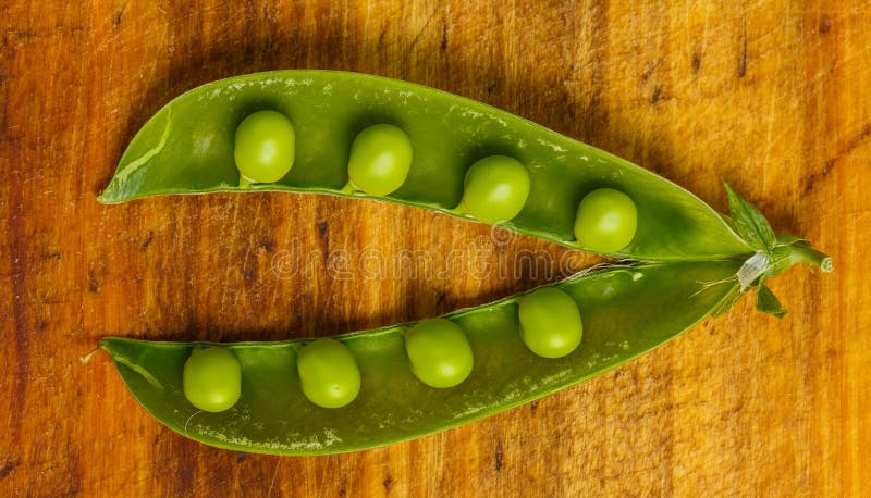 Ripe Green Peas on a Wooden Surface for Cooking Stock Image - Image of ...