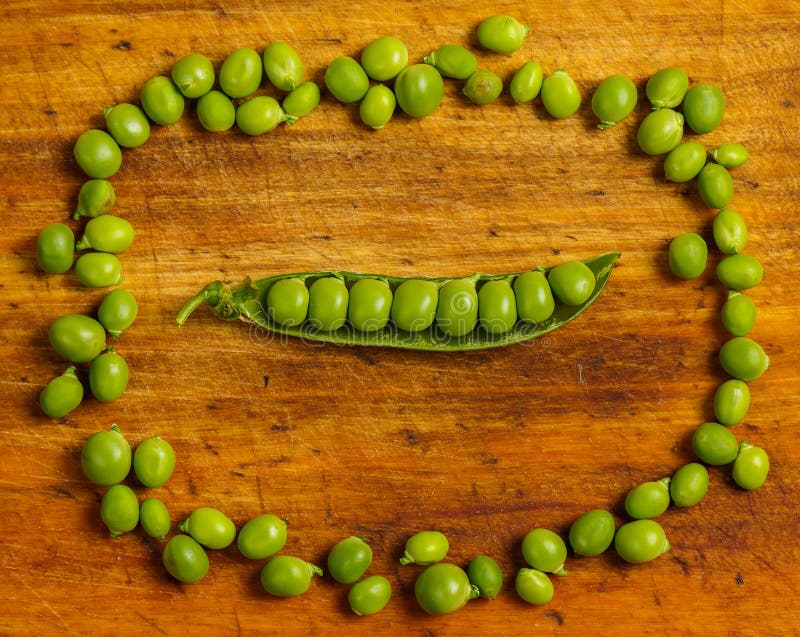 Ripe Green Peas on a Wooden Surface for Cooking Stock Image - Image of ...
