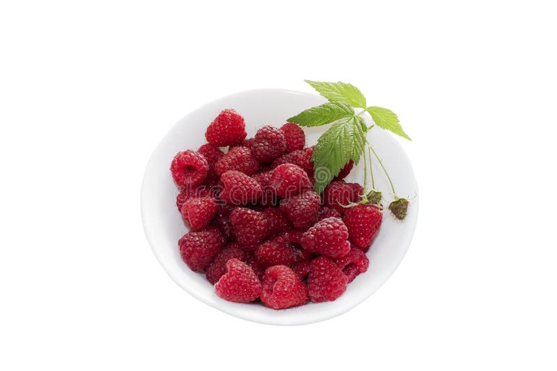 Ripe Large Raspberries with a Leaf and Flower in a Plate, Isolated on a ...