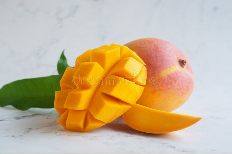 Ripe Mango Fruit and Mango Slice on Marble Background Stock Photo ...
