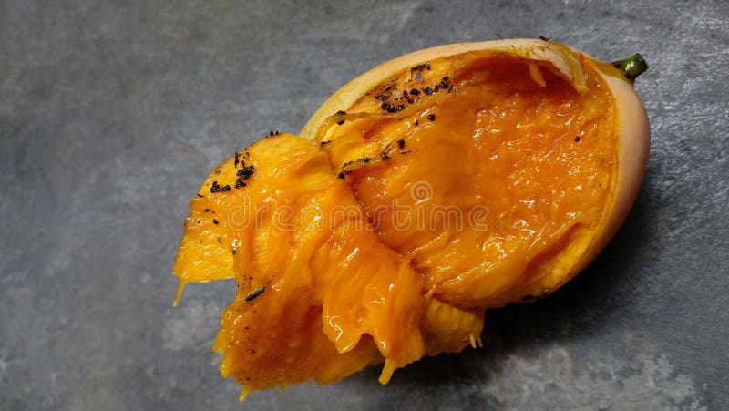 Ripe Mango. Mango Fruit Whose Skin Was Cracked Peeled Off because it ...