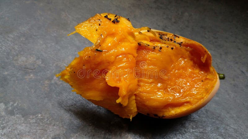 Ripe Mango. Mango Fruit Whose Skin Was Cracked Peeled Off because it ...
