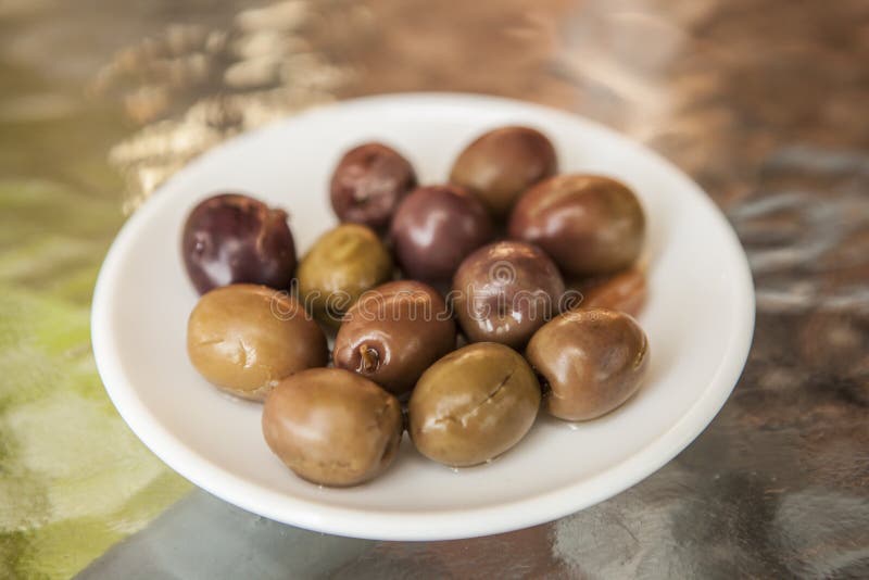 Ripe Olives on a Little Plate . Appetizer at the Bar. Stock Photo ...