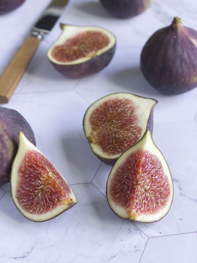 Ripe Figs with a Knife on a Marble Table Stock Photo - Image of surface ...
