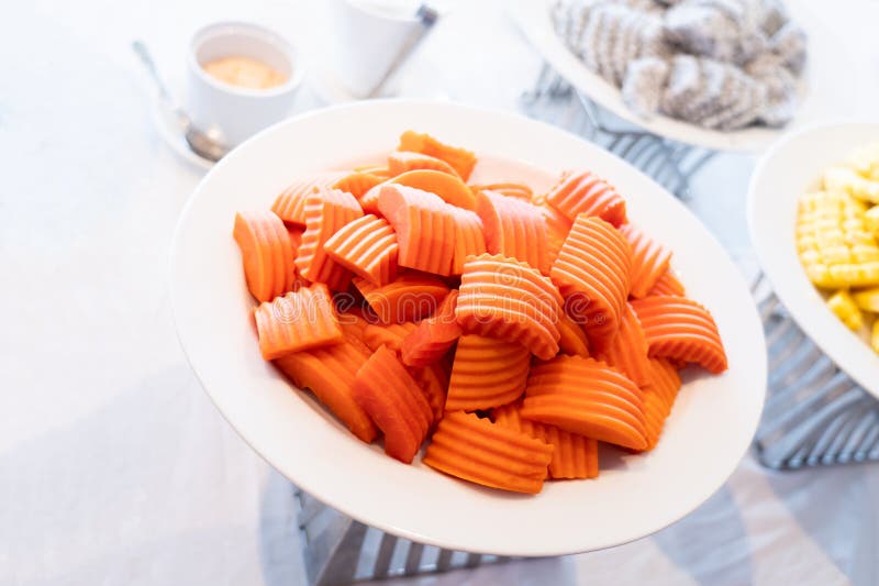 Ripe Papaya Cut into Pieces and Arranged on a Plate. Put it on the ...