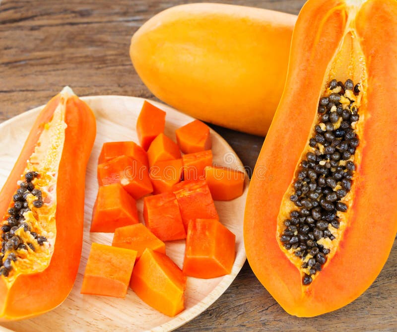 Ripe Papaya on Wooden Table Stock Photo - Image of diet, slice: 86638778