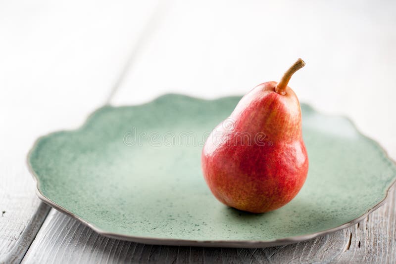 Ripe pear on the plate stock photo. Image of pear, garden - 56399962